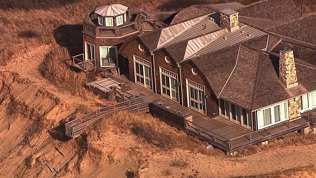 Massive house on the edge of Wellfleet dune in danger of collapse