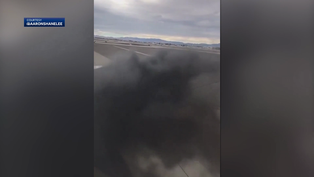 Passengers arrive in Logan after smoke pours out of plane's engine