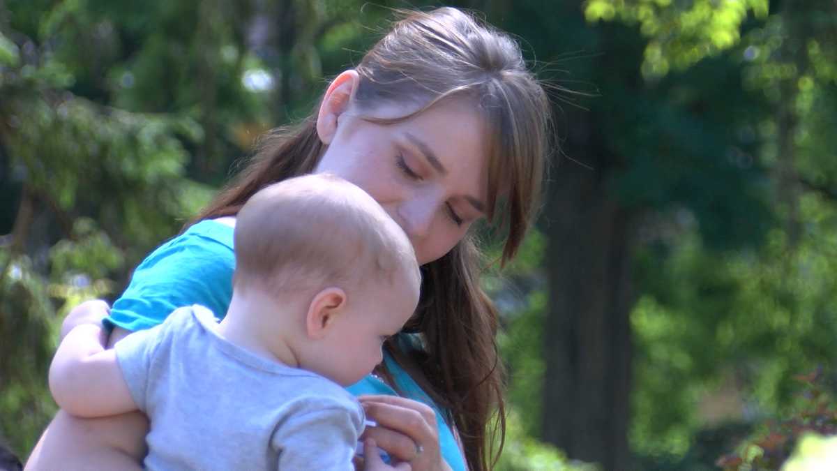 'Latch On' brings dozens of breastfeeding mothers, babies together