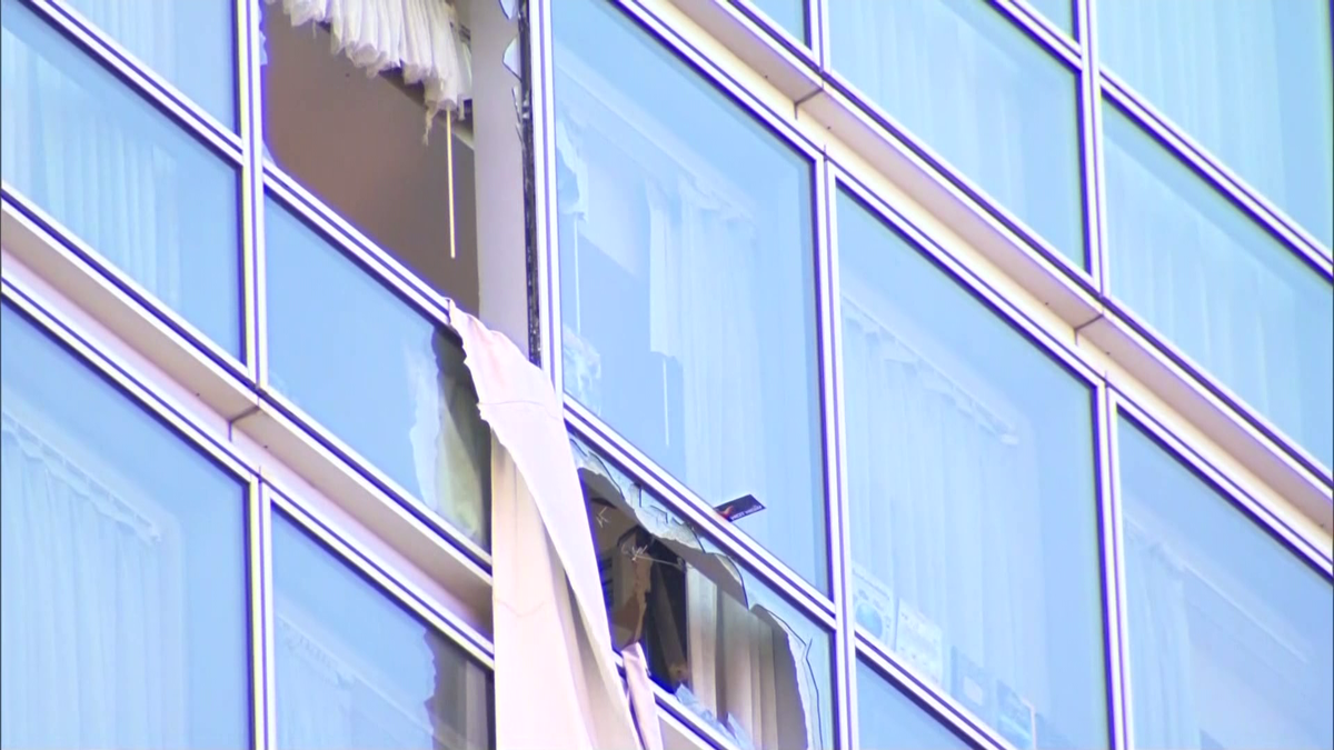 Man in custody after breaking Boston hotel room windows, throwing ...