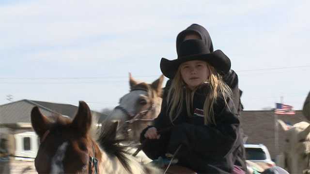 Wagon trains roll in to help kick off Dixie National Rodeo