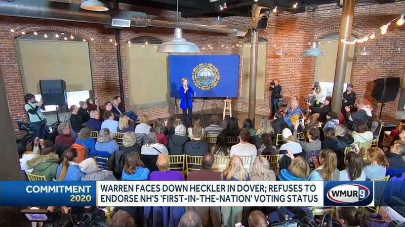 Warren confronted by angry voter at Dover event