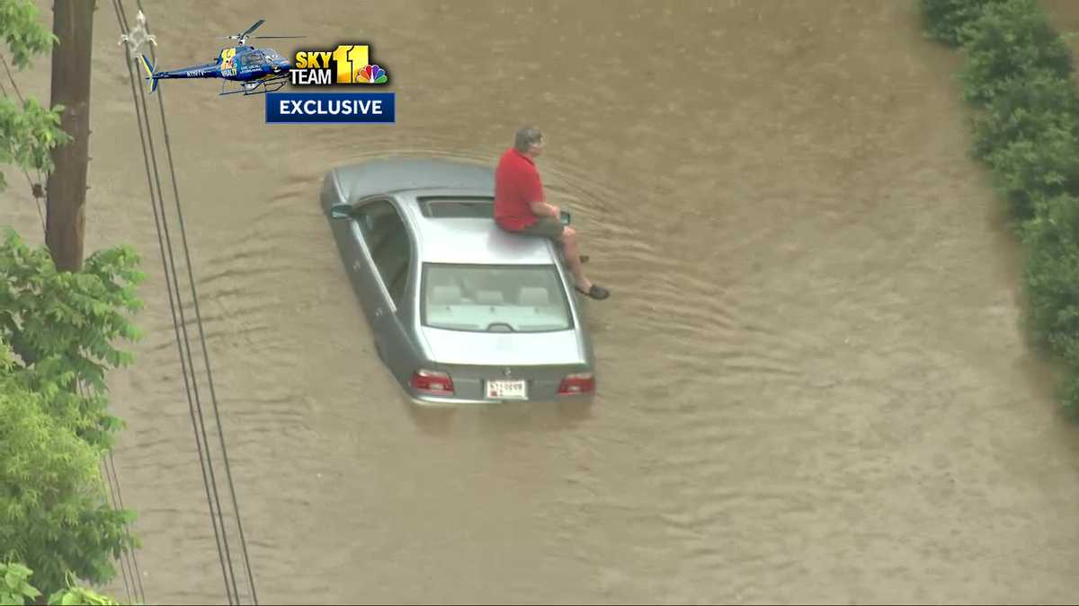 2 drivers stuck in high water on Ruxton Road rescued