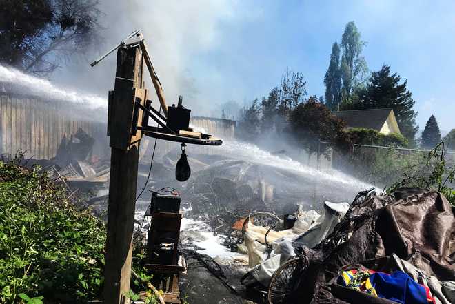 Watsonville firefighters save homes from burning
