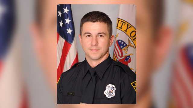 Police officer shot to death in Alabama; suspect in custody
