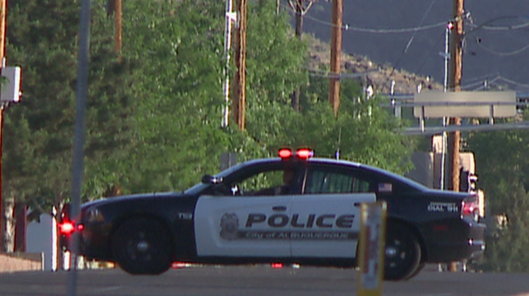 Albuquerque SWAT arrest suspect hiding inside vehicle