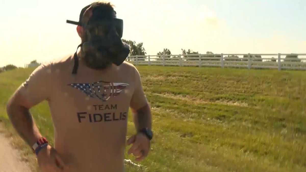 Masked man raises awareness about veteran suicide with 102 mile journey