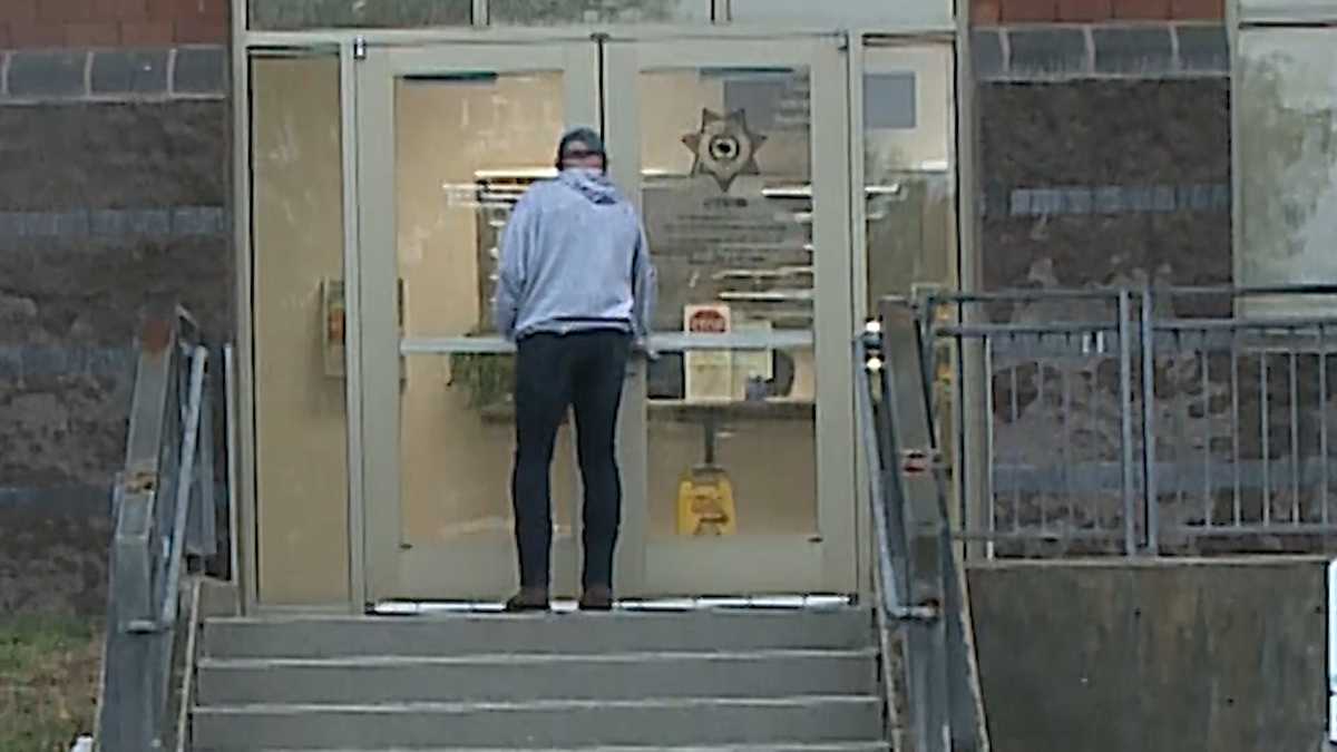 A former officer told 911 his girlfriend shot herself. Now he's charged with tampering with evidence