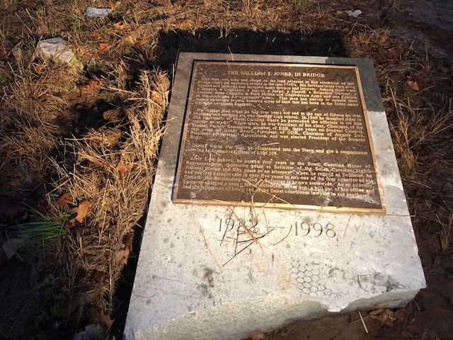 Driver dies after car hits guardrail, monument, troopers say