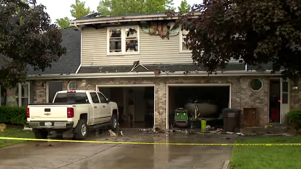 Two people escape burning home in Racine County
