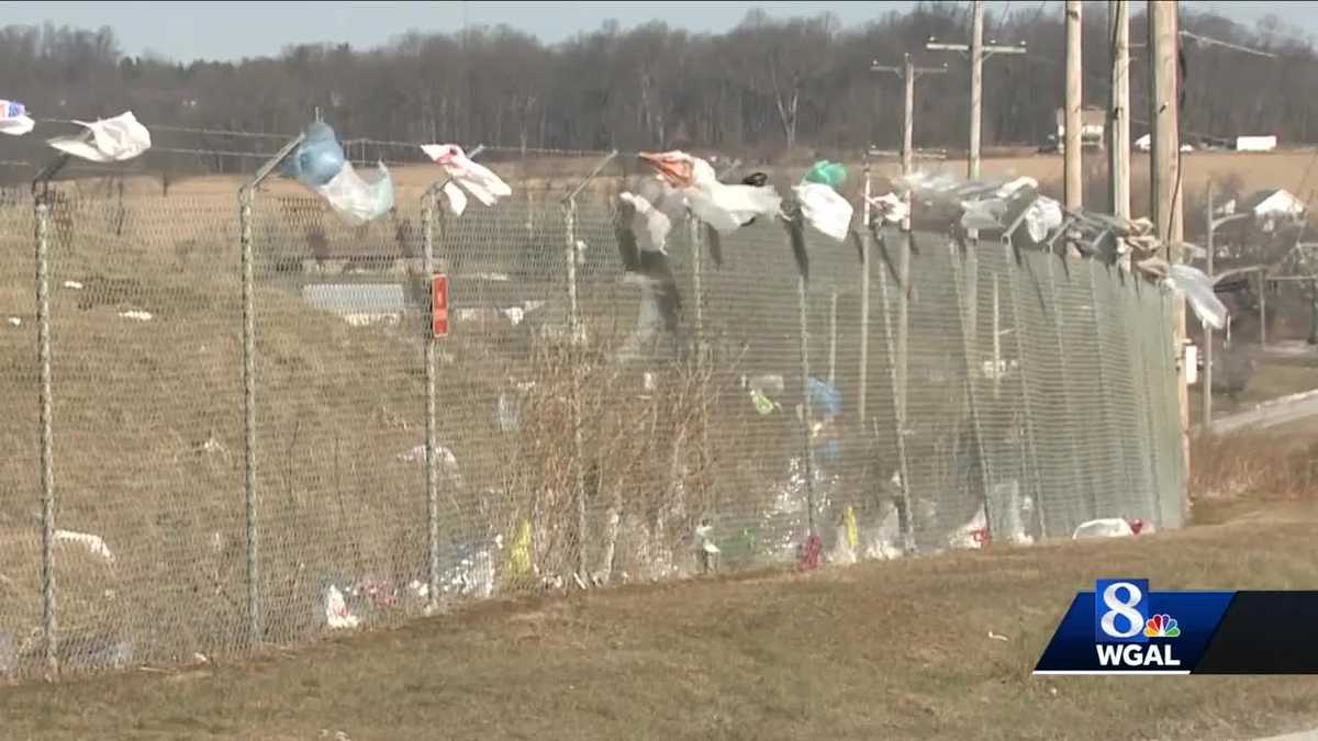 Wind scatters trash at landfill