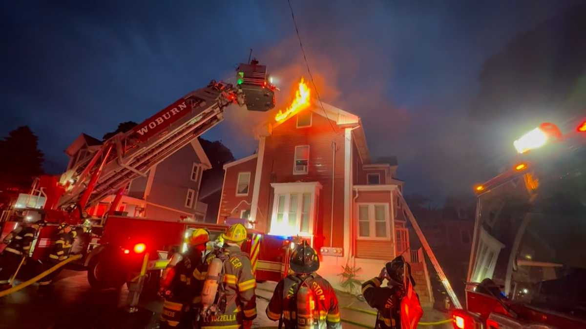 Girl rescued from roof of burning Woburn home, firefighters say