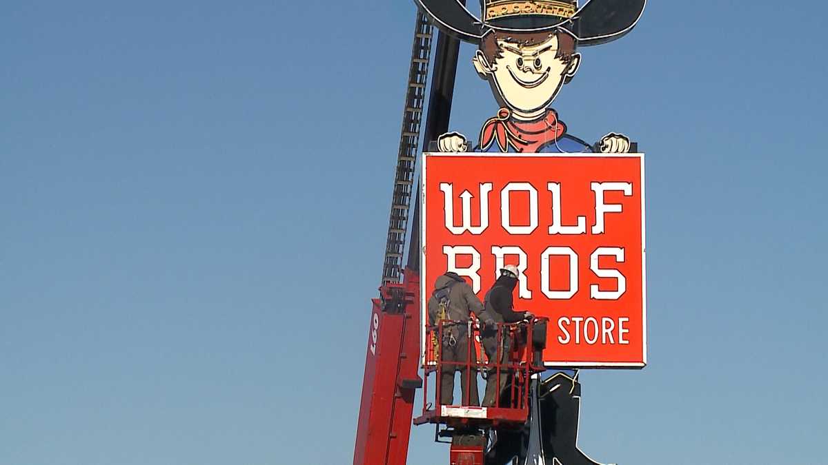 Iconic Wolf Bros. Western Store sign comes down at 72nd and Dodge
