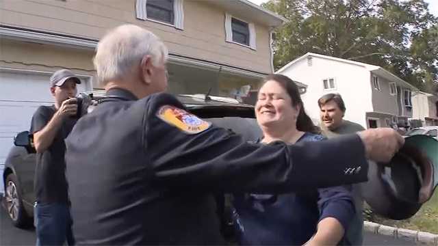 Off Duty Firefighter Rescues Woman Seconds Before Train Slams Into Vehicle
