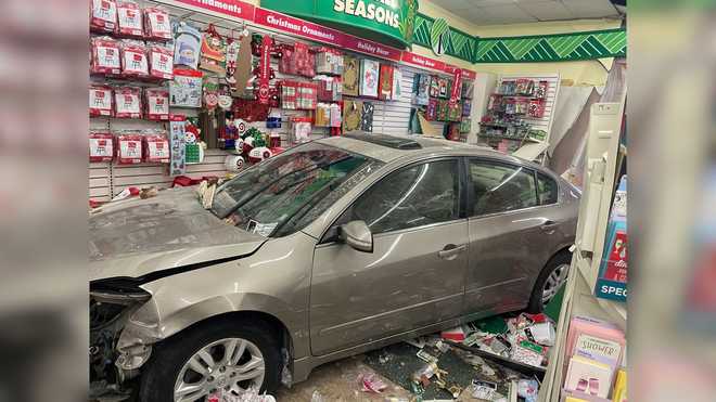 Driver hospitalized after car crashes into Dollar Tree store in Worcester