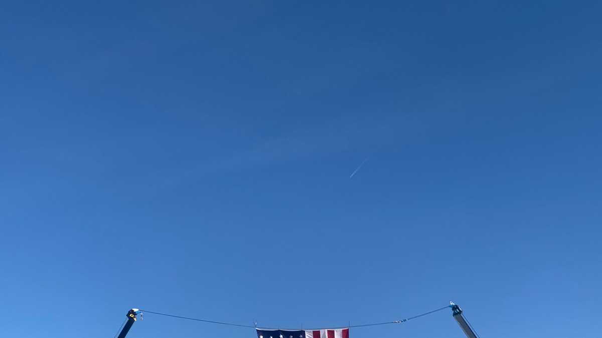 Motorcade procession honors John Shelton