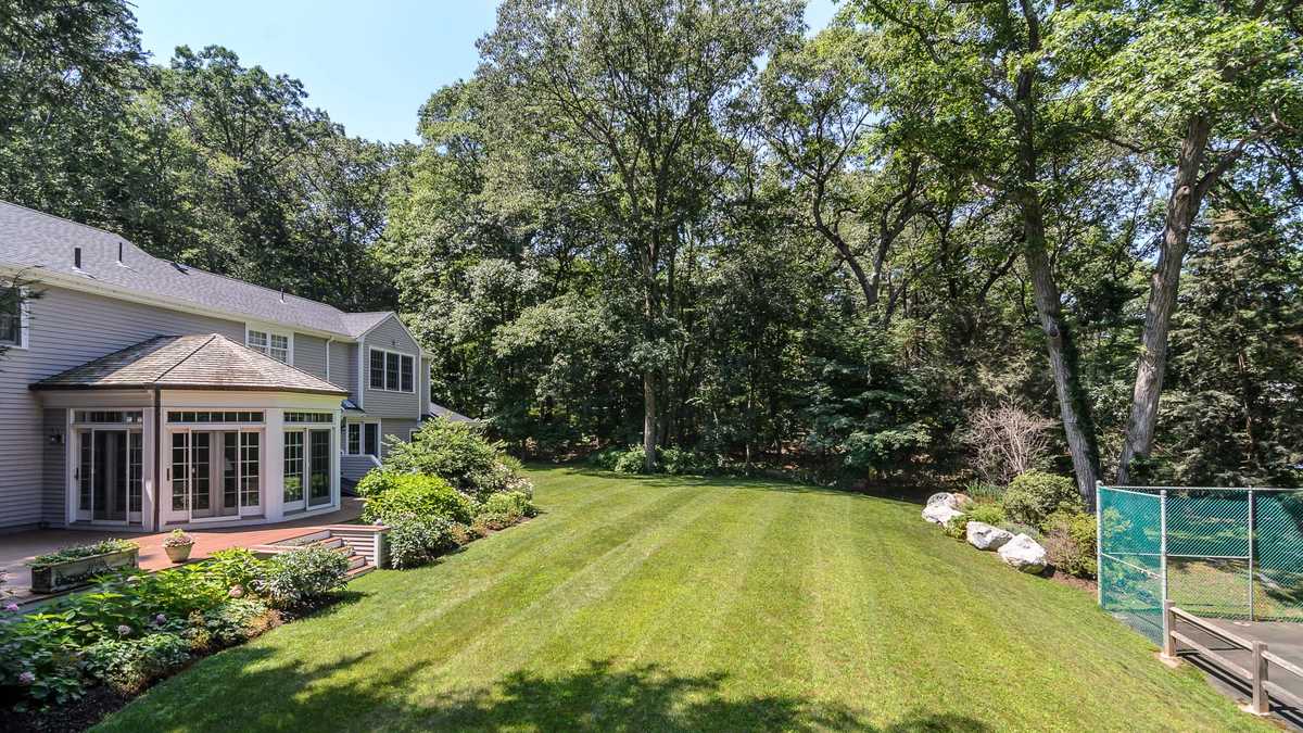 Spectacular $2.39M colonial has tennis court, magnificent grounds