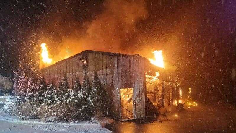 Crews battle commercial garage fire as snow falls in York