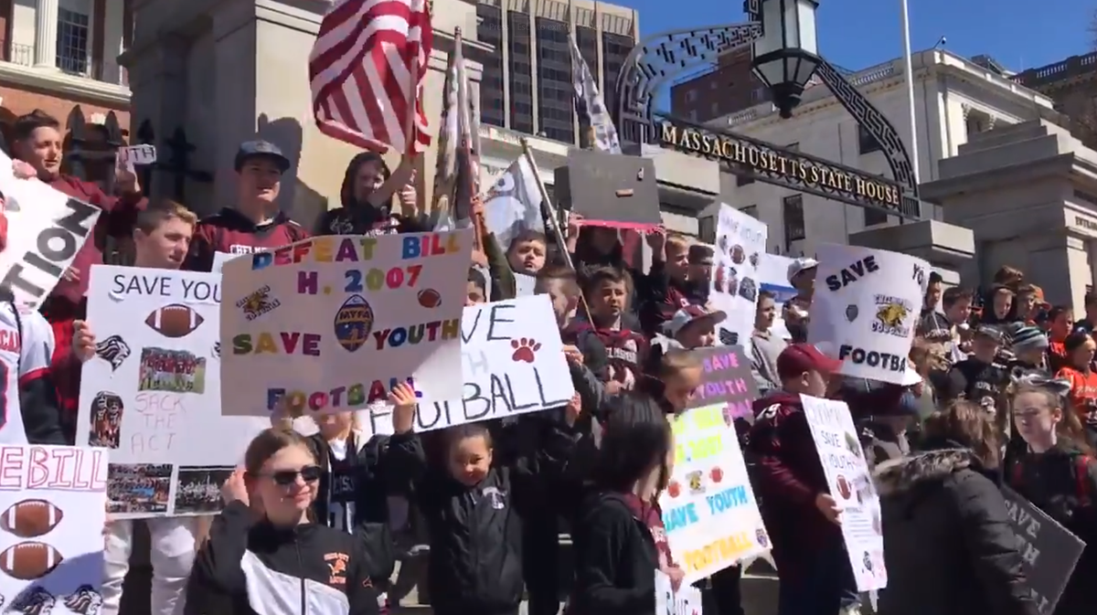 Fans of youth tackle football rally outside State House to 'save' sport