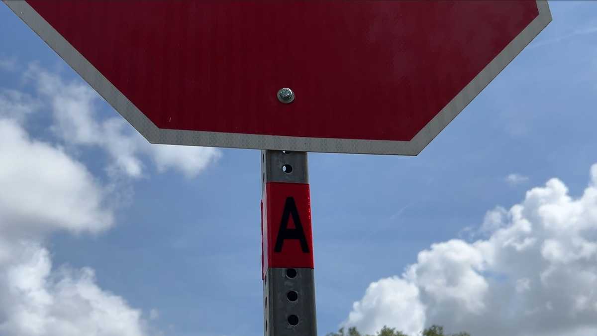 Charlotte County installs reflective evacuation zone bands on stop signs