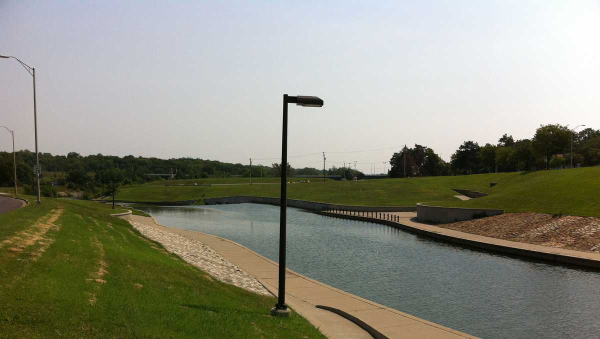 Bystanders help rescue mower from Brush Creek