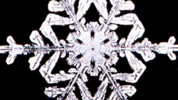 Kids learning about science of snowflakes