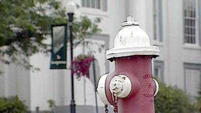 Report of a crash involving a fire hydrant on Houston Road in Pleasant Run