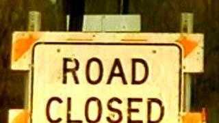 Hamilton police block lane on OH-4 Bypass for concrete in the roadway