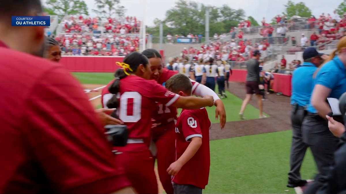 Boy helped by crowd to finish national anthem at OU game