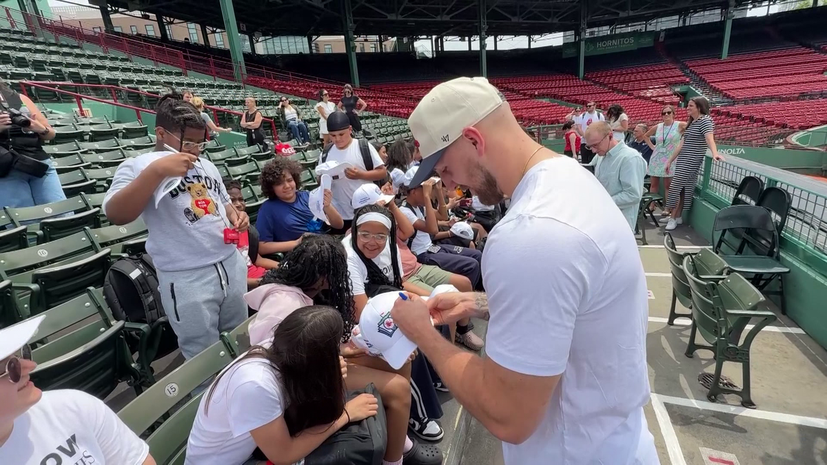 Boston students surprised by Red Sox pitcher during Fenway tour