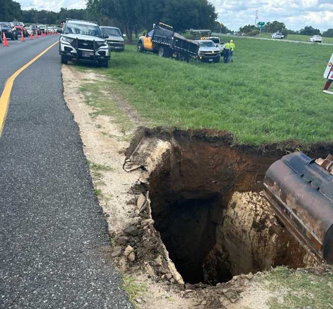 Lane closure in Marion County after large hole opens alongside highway ...