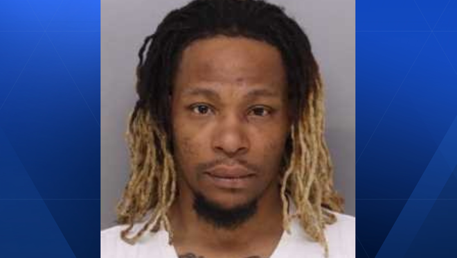 Police searching for Woodlawn man accused of pushing victim into traffic