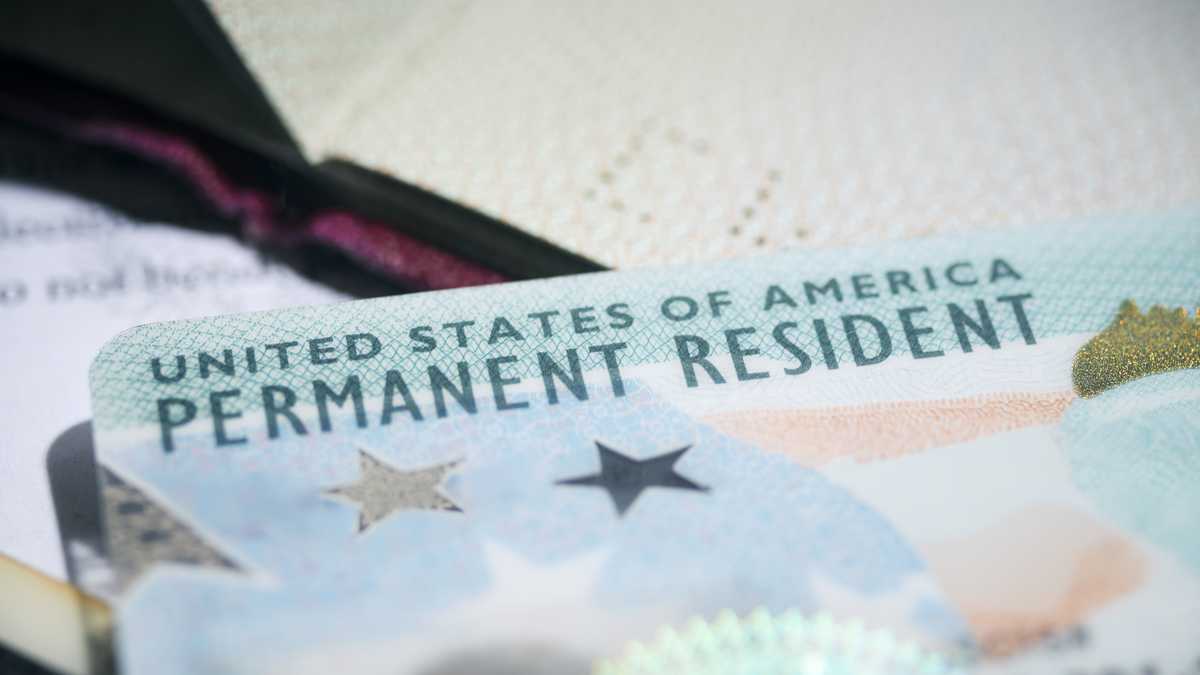 How is Trump changing the green card application process?