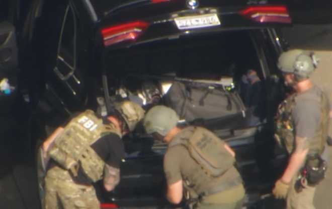 Man charged after threats against Trump found on vehicle