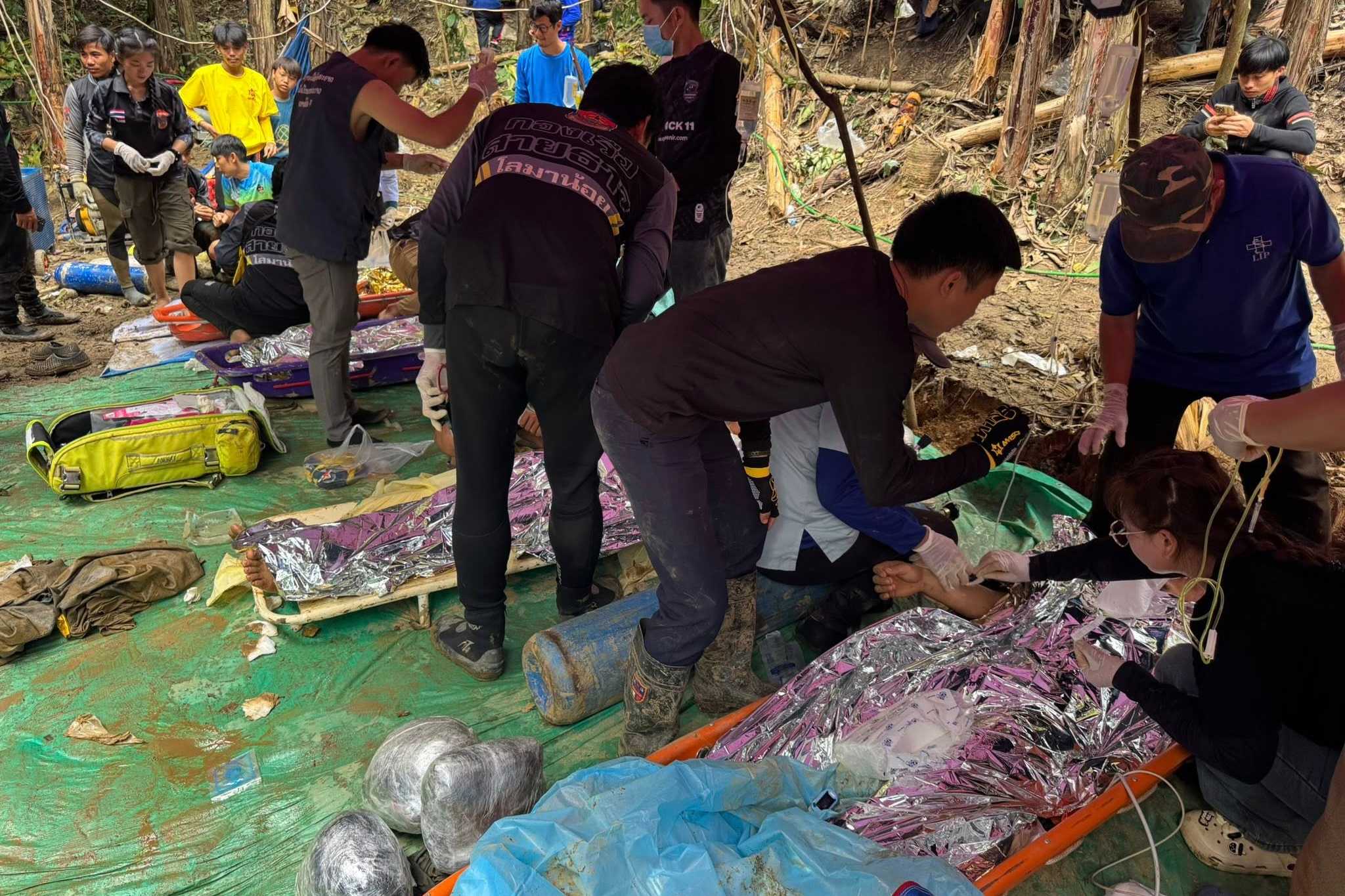 Rescuers free 4 men who had been trapped in flooded Laos cave - WISN
