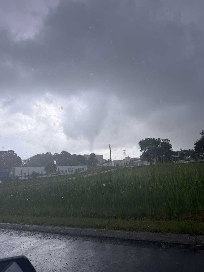 Funnel cloud forms near downtown Melbourne