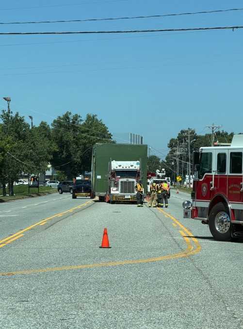 Power lines down along Pelham Road leads to power outage at business