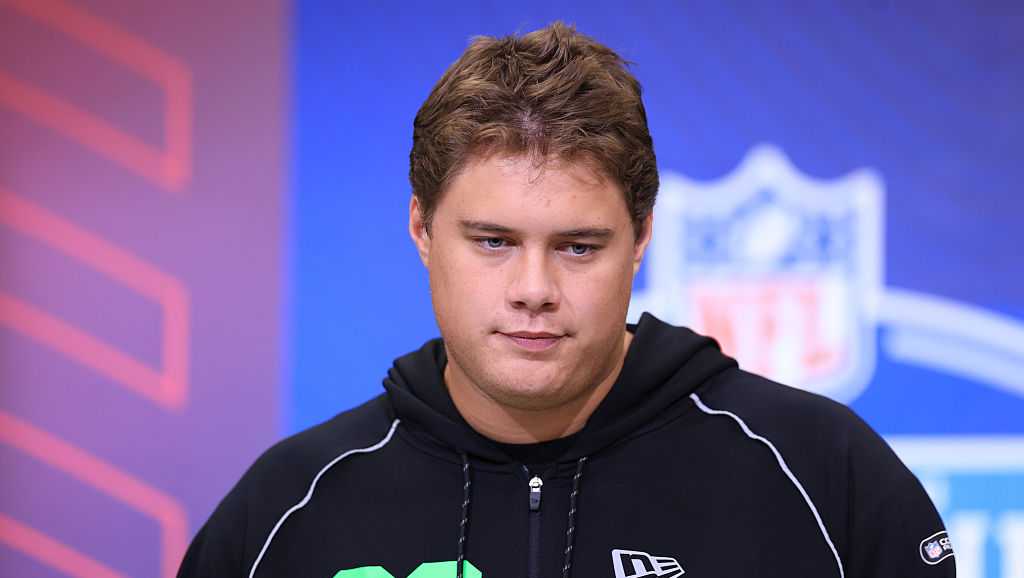 Patriots trade up in NFL draft, take Utah left tackle Caleb Lomu