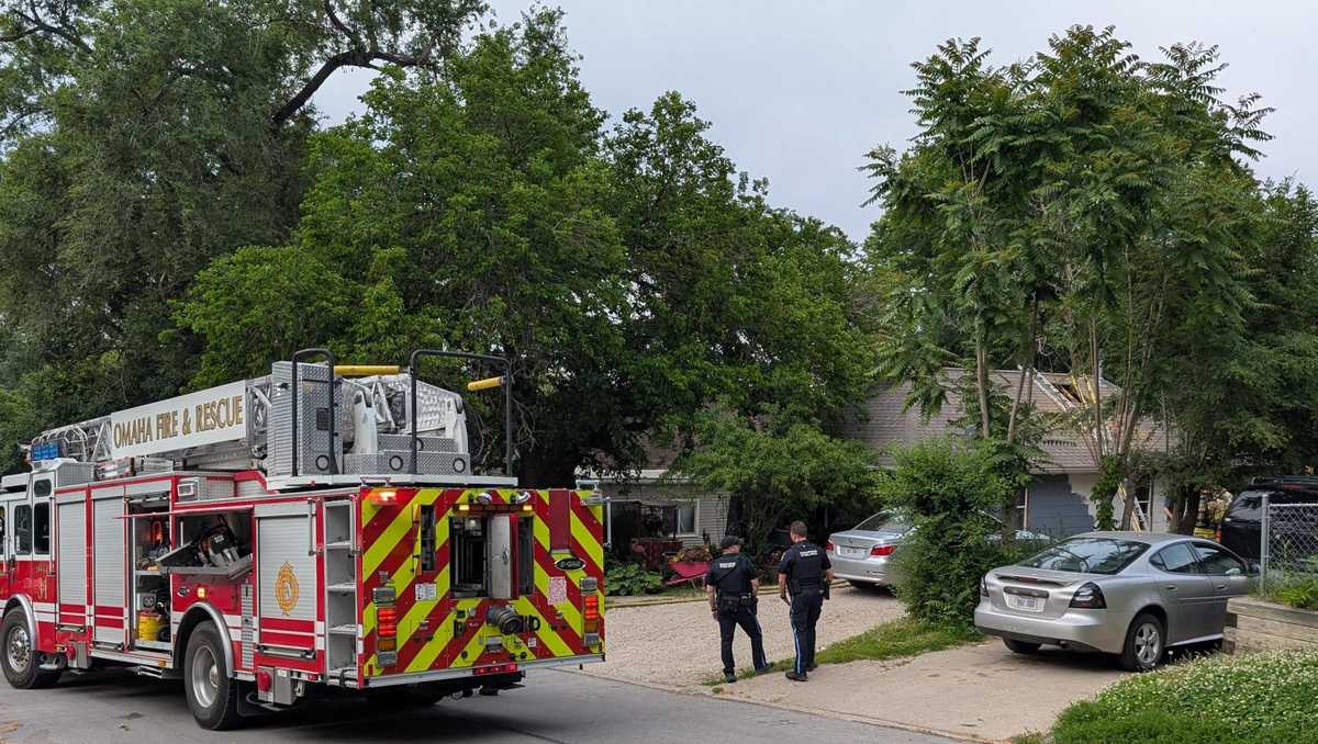 Omaha firefighters battle house fire