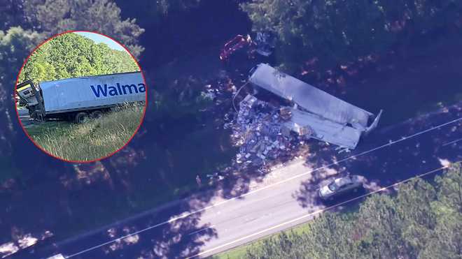 3 accused of using cards of driver killed in Walmart truck crash