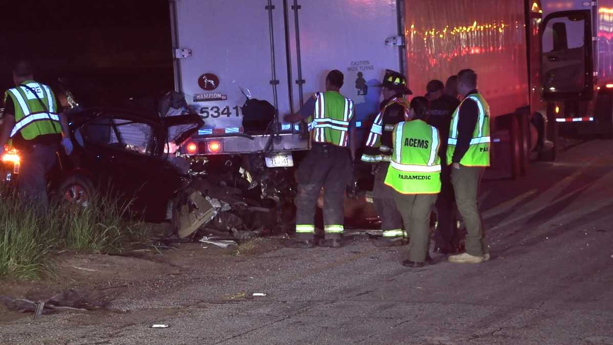 Car hit parked tractor-trailer, driver killed