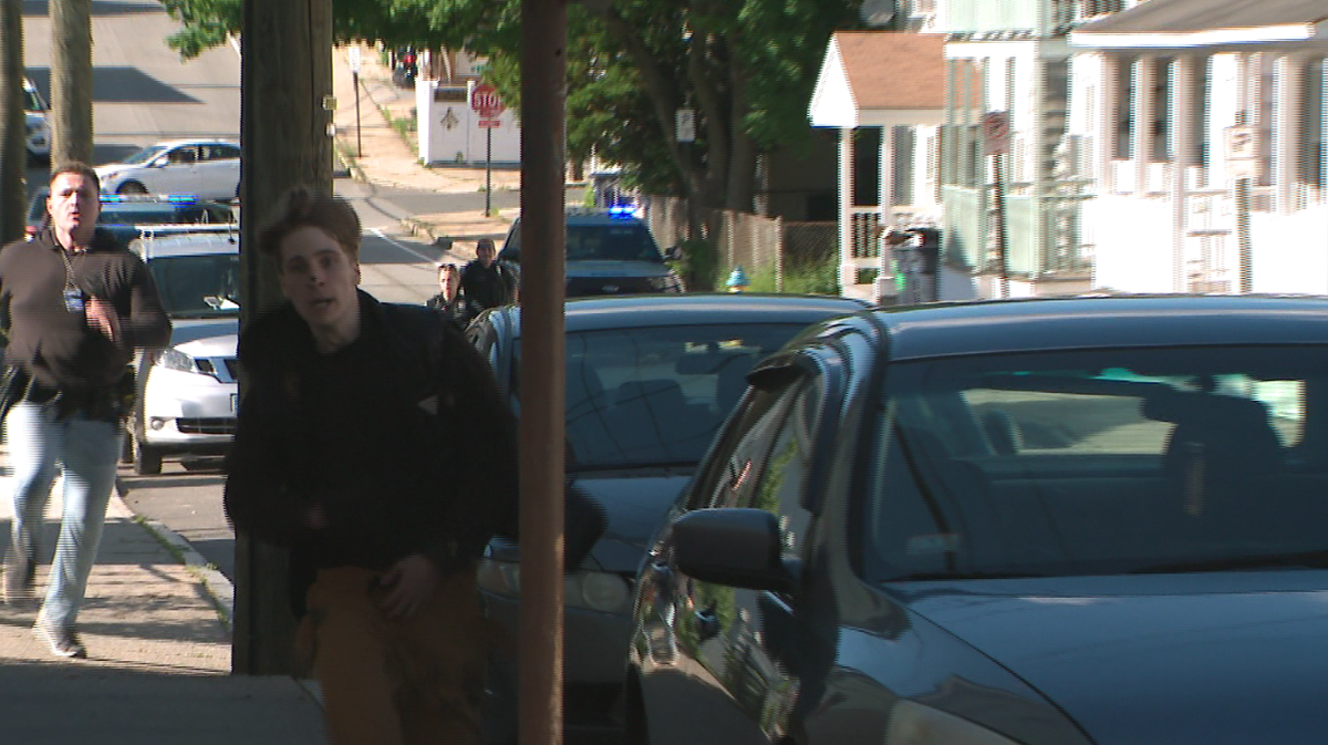 Teen caught on camera running from police appears in court