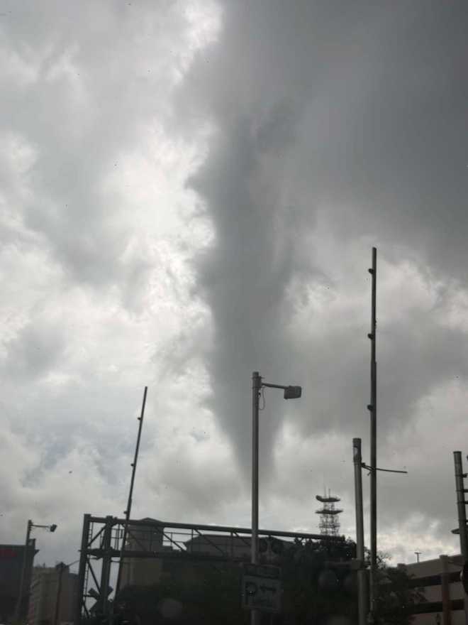 Funnel cloud forms near downtown Melbourne