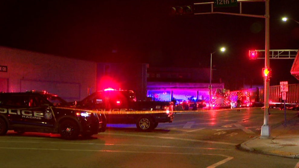 Woman injured after car crashes into train in Racine