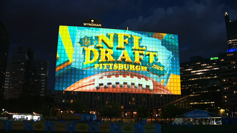 Front of Wyndham Grand transforms into backdrop for NFL Draft light ...