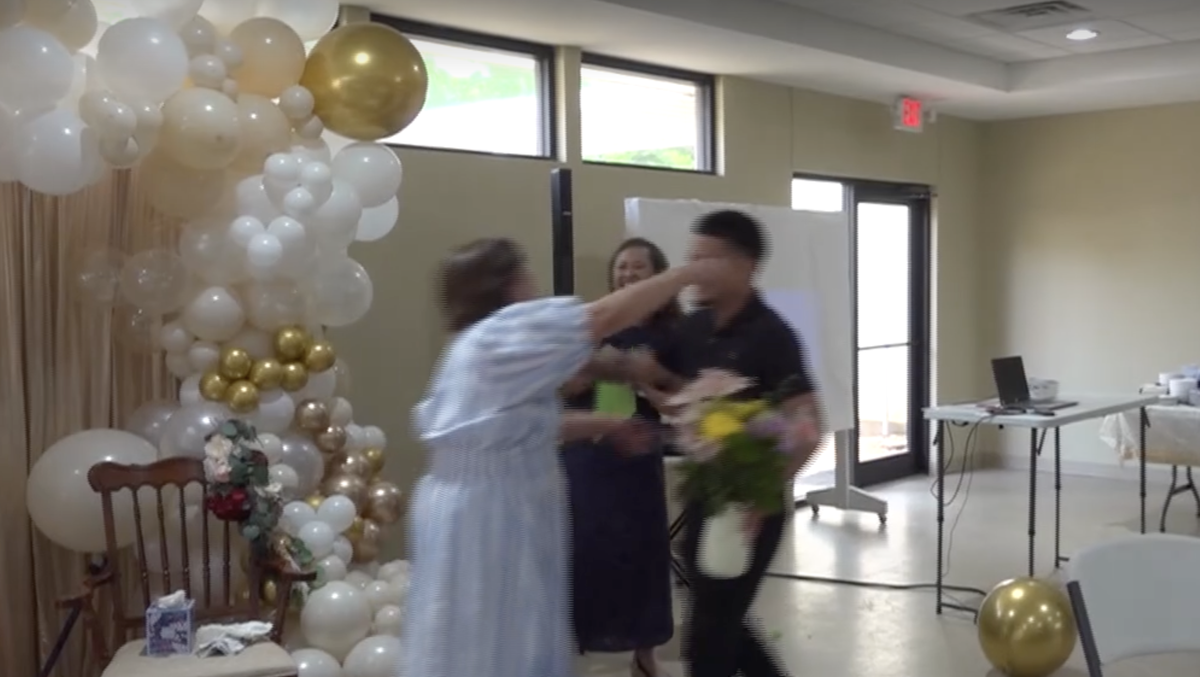 Mother and son reunite after 20 years apart at birthday party
