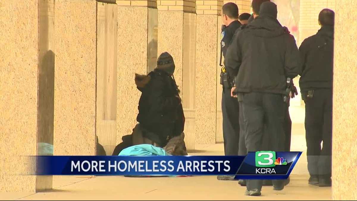 Police arrest homeless protesters outside City Hall