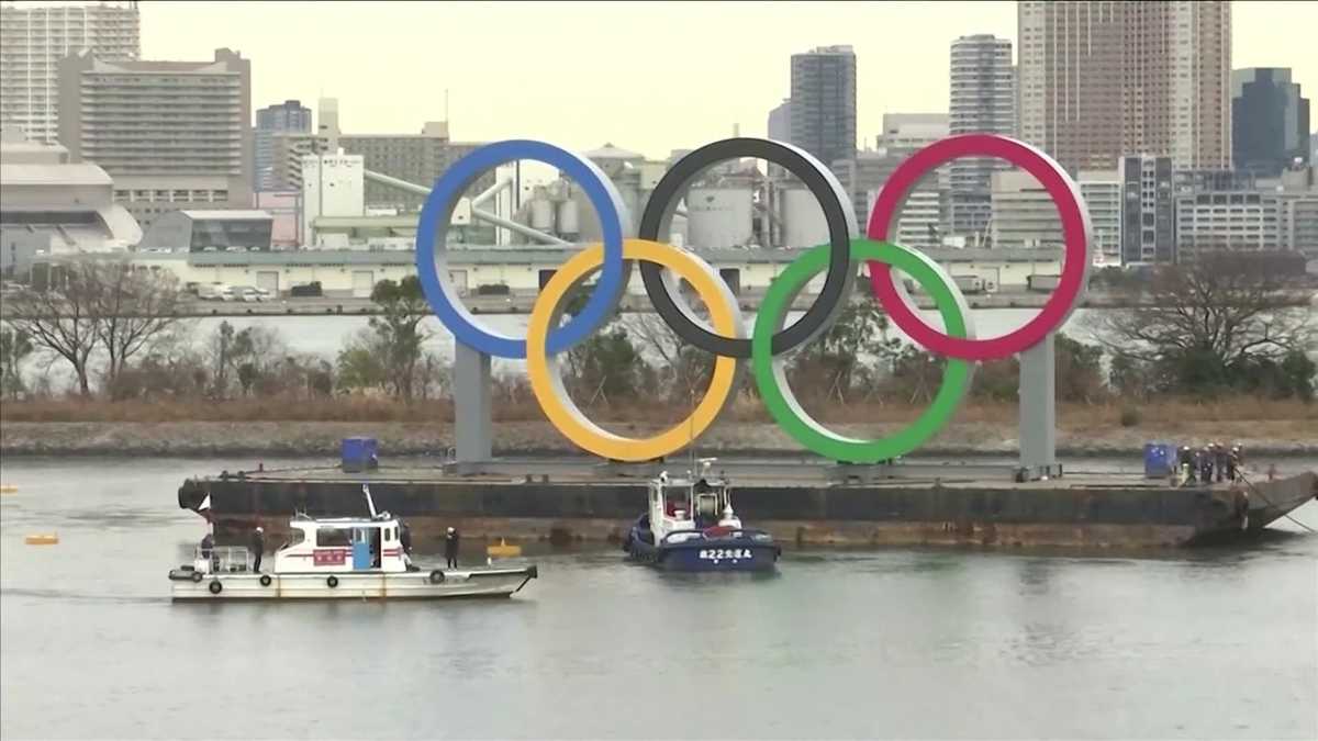 Olympic rings arrive in host city on barge into Tokyo Bay