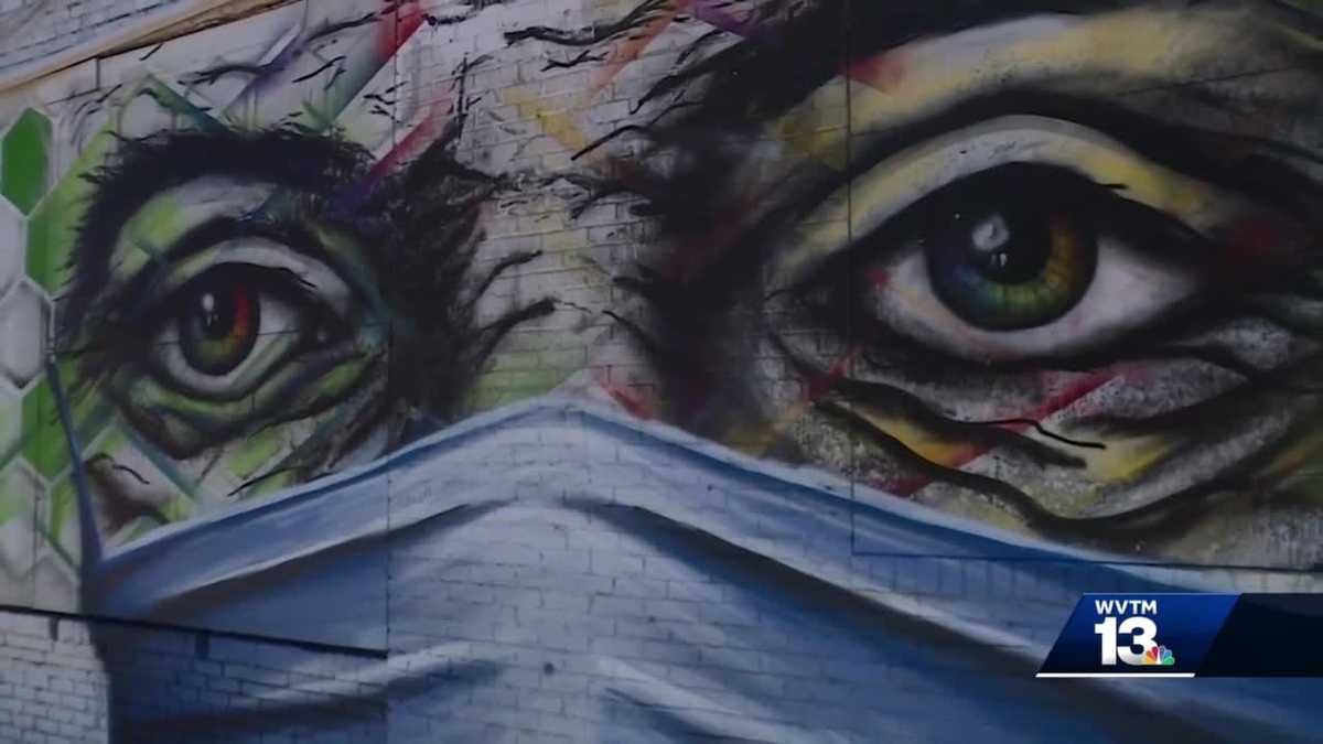 Local artist updates north Avondale mural to reflect Coronavirus pandemic
