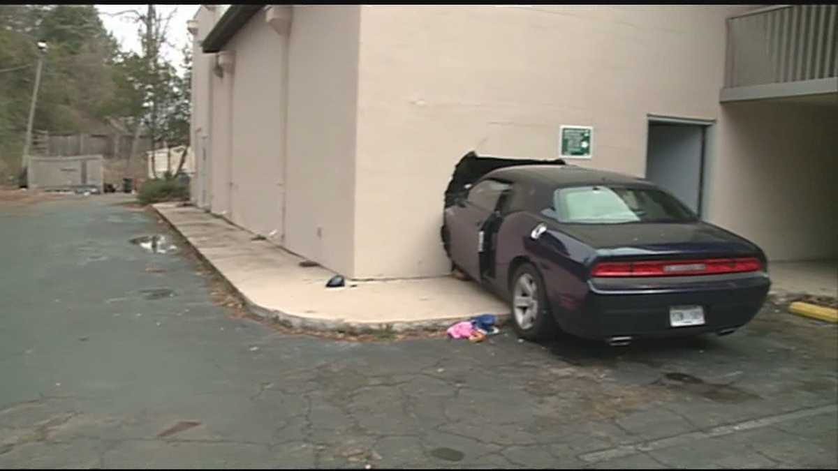 Car crashes into building